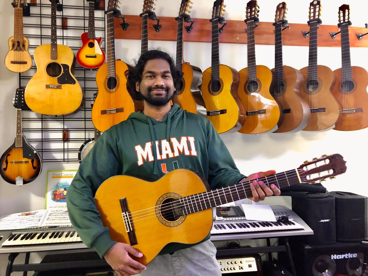 Charlton with his new 1977 Matsuoka No. 30 classical guitar – Neil Ta Music