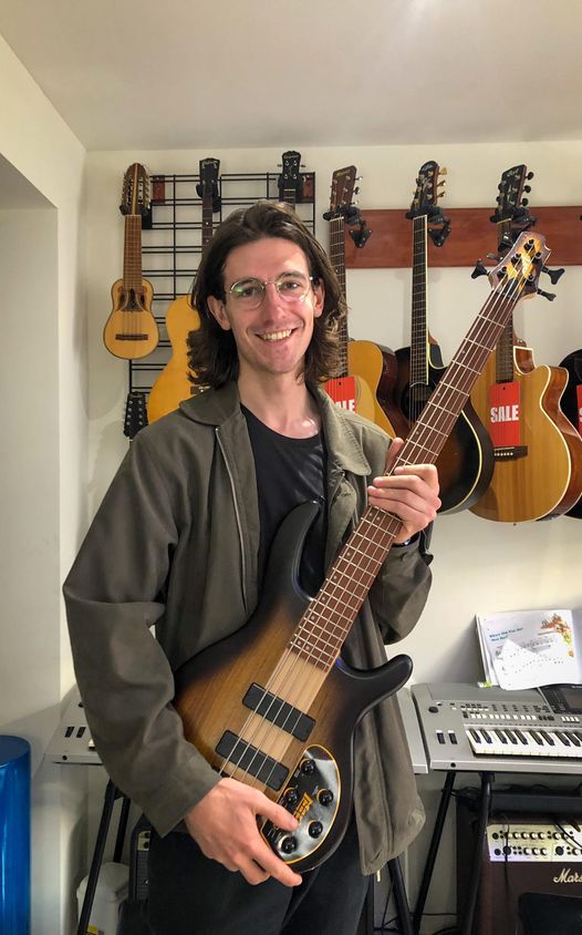 Max with his new 5-string bass guitar – Neil Ta Music