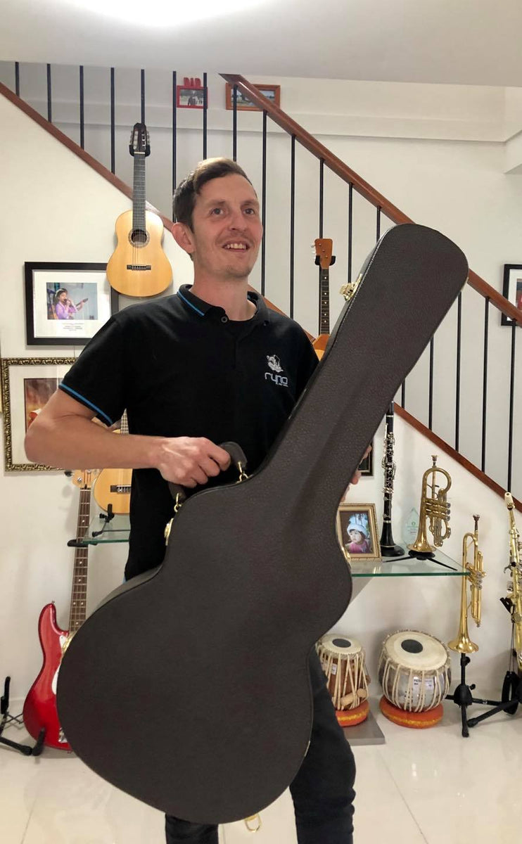 Ryno with his new Grand Auditorium Taylor – Neil Ta Music